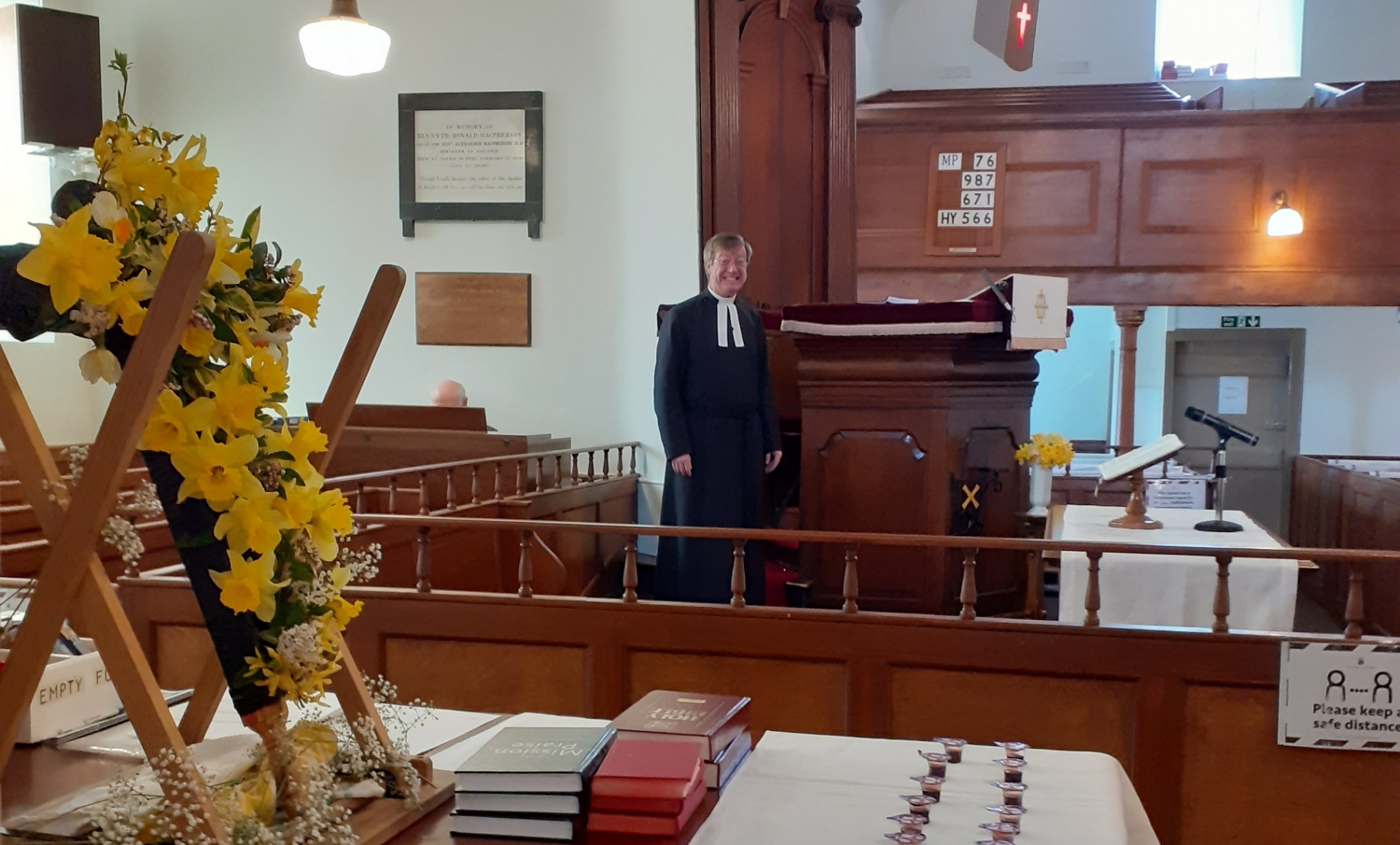 Flower arrangement in the shape of a cross by Shona Duncan, assisted by ...